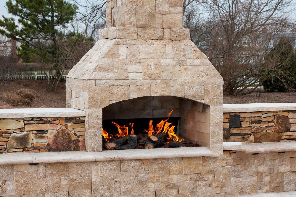 6 Outdoor Fireplace Ideas For a Cozy Backyard