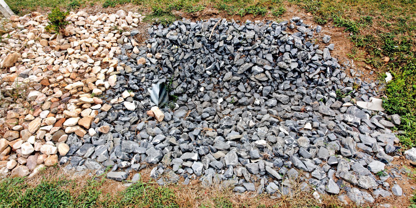 Landscaping Around Drainage Ditch Man Clears Drainage Ditch In